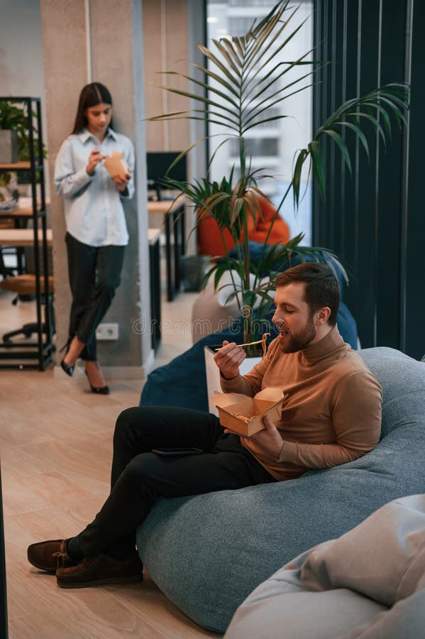 Office Workers are in the Rest Zone is Having a Break and Eating Food ...