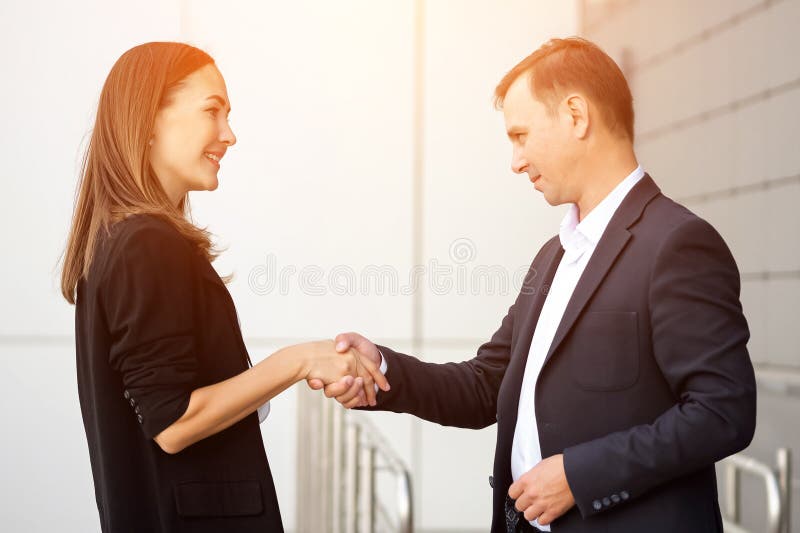 Office Workers Shake Hands with Perspective of Joint Project Stock ...