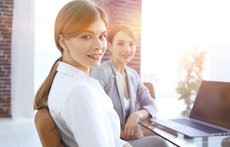 Office Workers Sitting Behind a Desk. Stock Photo - Image of business ...