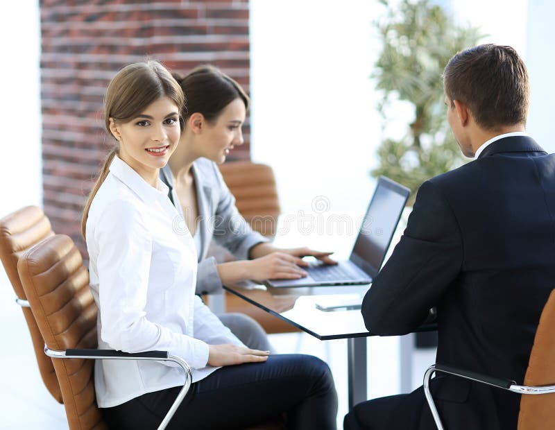 Office Workers Sitting Behind a Desk. Stock Image - Image of manager ...