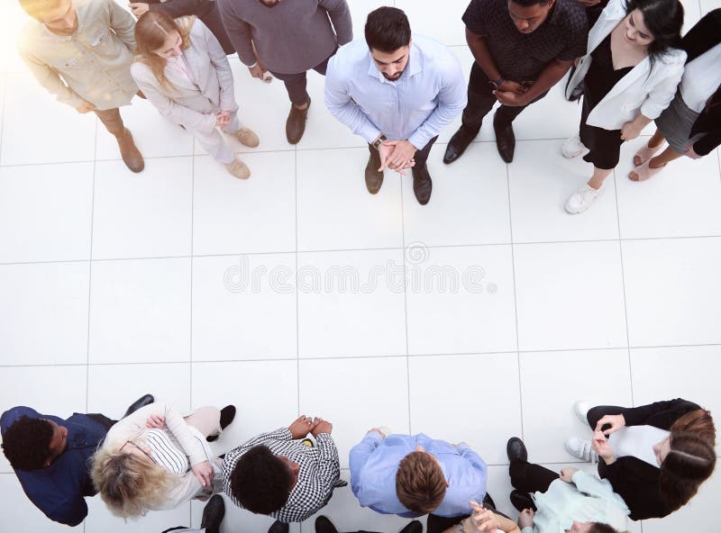 Office Workers Stand and Talk in the Office Lobby.Top View. Stock Photo ...