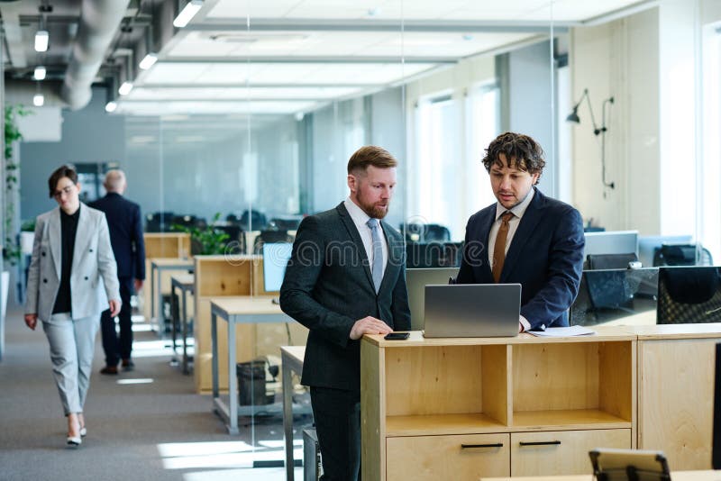 Office Workers Using Laptop at Work Stock Image - Image of manager ...