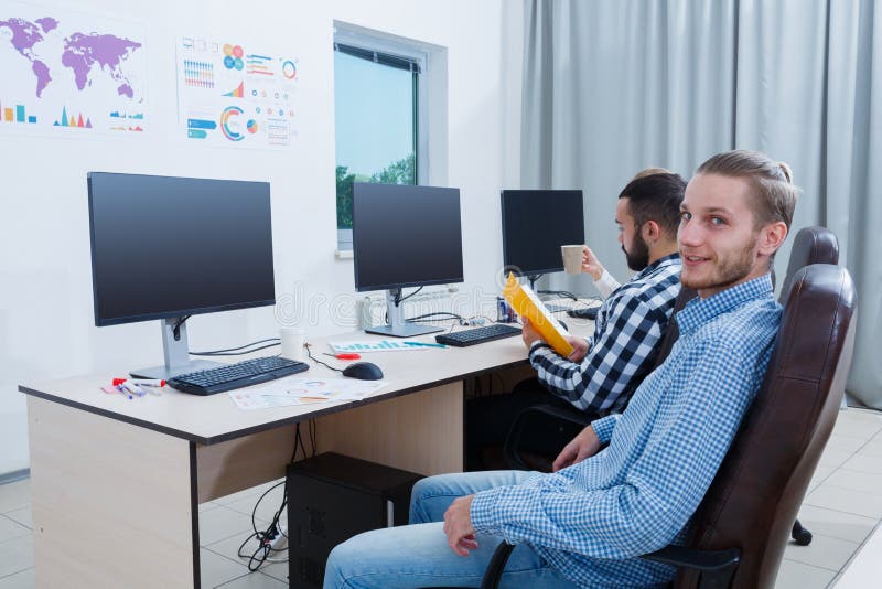 Office with Workers Who are Sitting at the Computers Stock Image ...