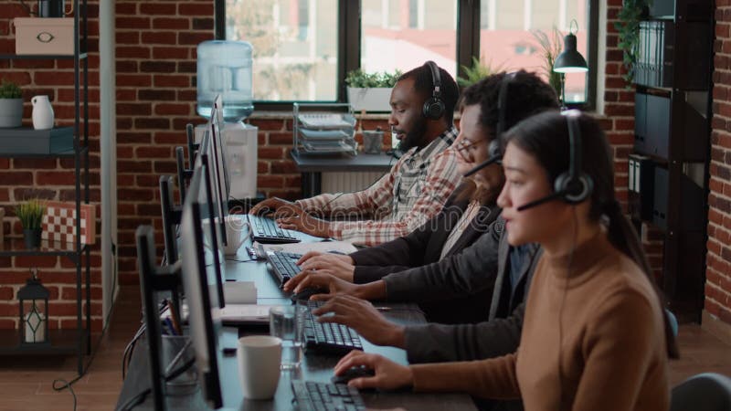 Office Workers Working at Call Center Office To Help People Stock Video ...