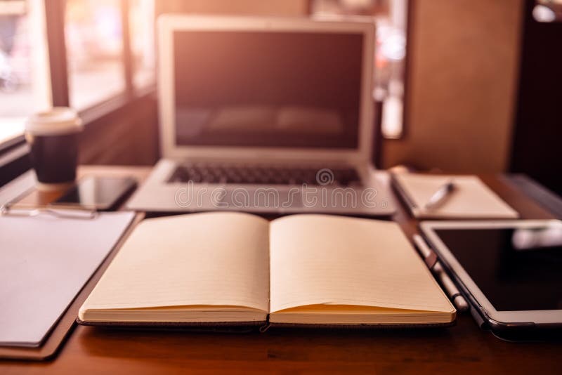 Office Workplace with Laptop, Calculator, Book and Document on Wood ...