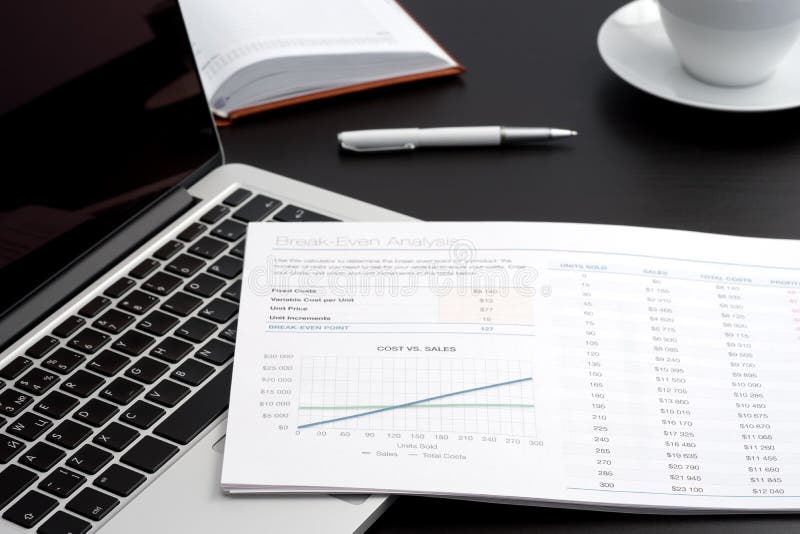 Office Workplace with Laptop Stock Photo - Image of calculators, graphs ...