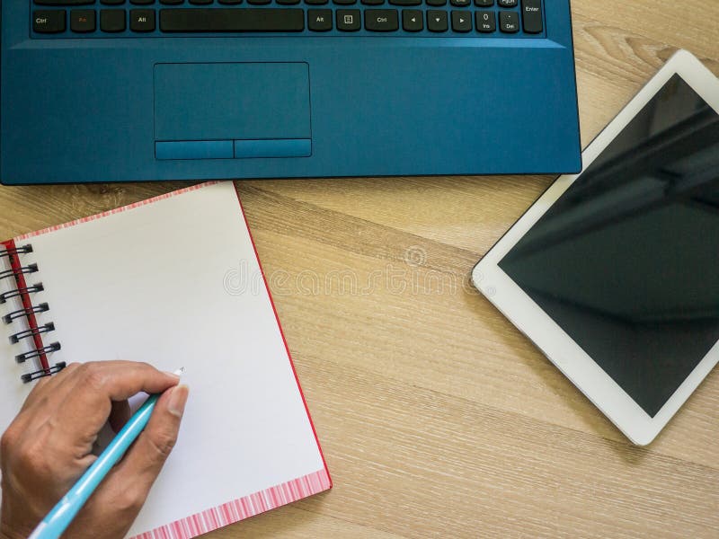 Office Workplace with Laptop, Notebook, Tablet and Pen on Wood Table ...