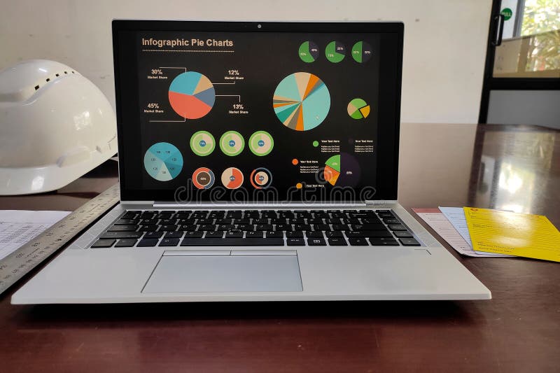 Office Workplace with a Laptop, Notes, and a Hard Hat on a Conference ...