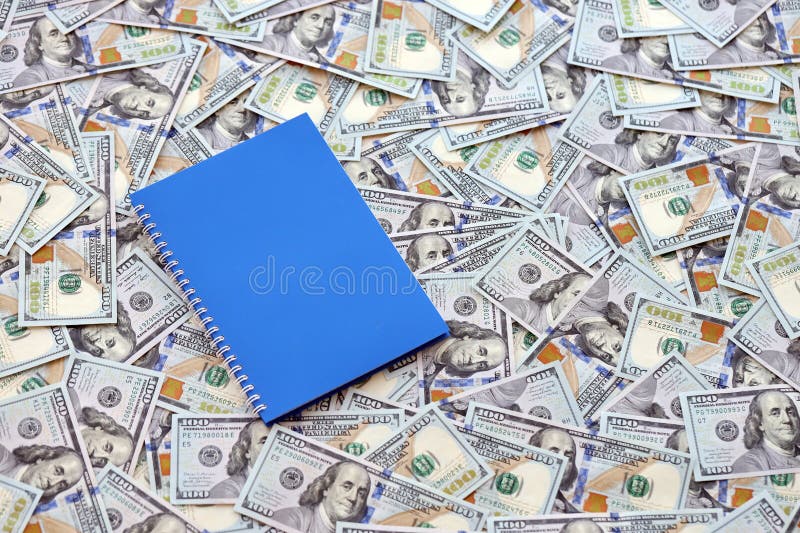 Office Workplace Table with Blank Notebook or Notepad and Many Hundred ...