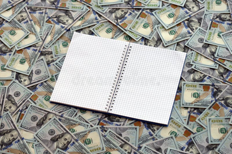 Office Workplace Table with Blank Notebook or Notepad and Many Hundred ...