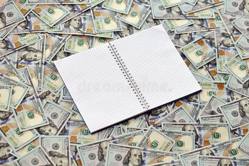 Office Workplace Table with Blank Notebook or Notepad and Many Hundred ...