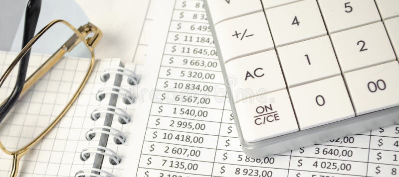 Office Workplace Table with Charts, Glasses and Calculator Stock Image ...
