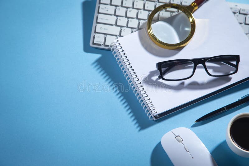 Office Workspace. Computer Keyboard, Eyeglasses, Mouse, Notepad, Pen ...