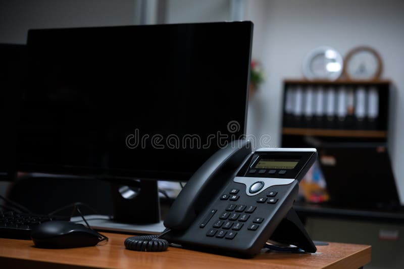 Office Workspace with Telephone and Computer on Table Stock Image ...