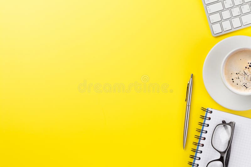 Office Yellow Backdrop with Coffee, Supplies and Computer Stock Photo ...