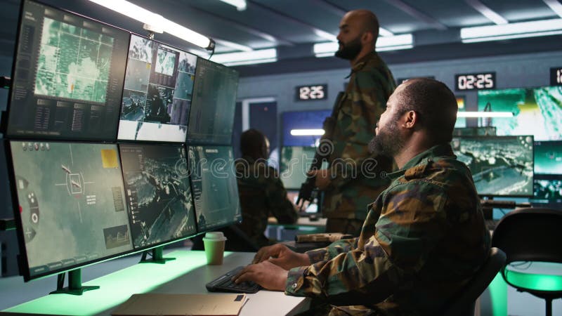 Team of Agents in Base of Operations Doing Assessment of Adversaries ...