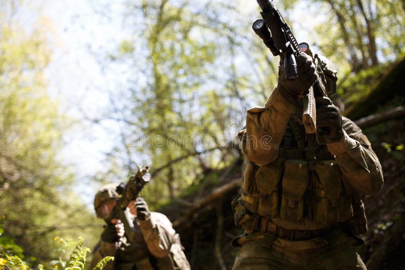 Officer with gun in forest stock photo. Image of officer - 93424034