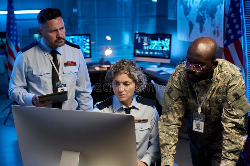 Officers Discussing Online Information Stock Photo - Image of ...