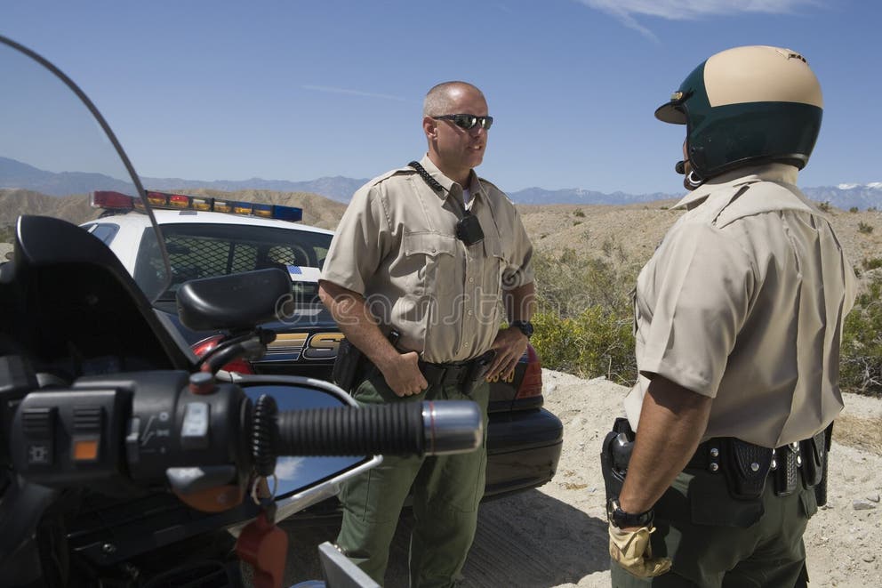 Officers Talking with Each Other Stock Image - Image of outdoors ...