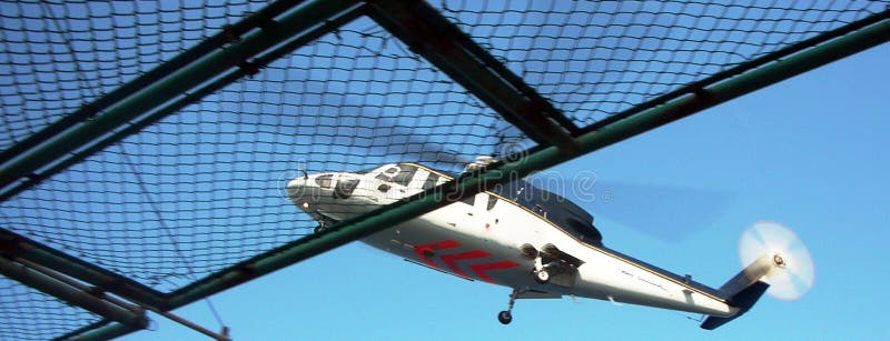 Offshore Crew Change Chopper Landing on Rig. Stock Photo - Image of ...