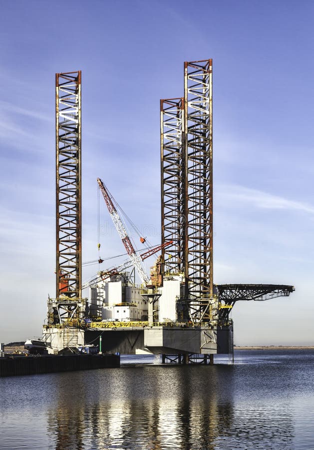 Oil Rig stock image. Image of port, pump, drilling, clouds - 12665229