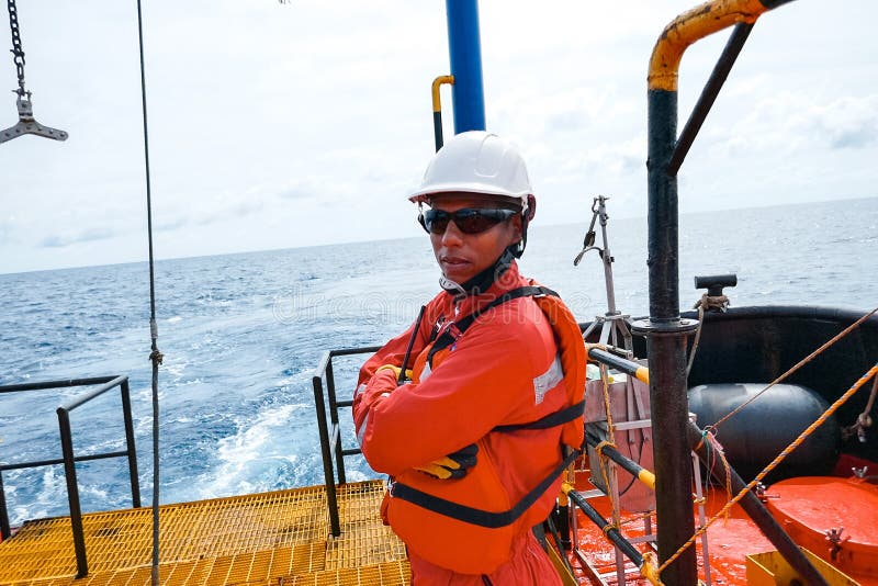 Offshore Engineer, Standing on the Deck of an Industrial Ship Stock ...