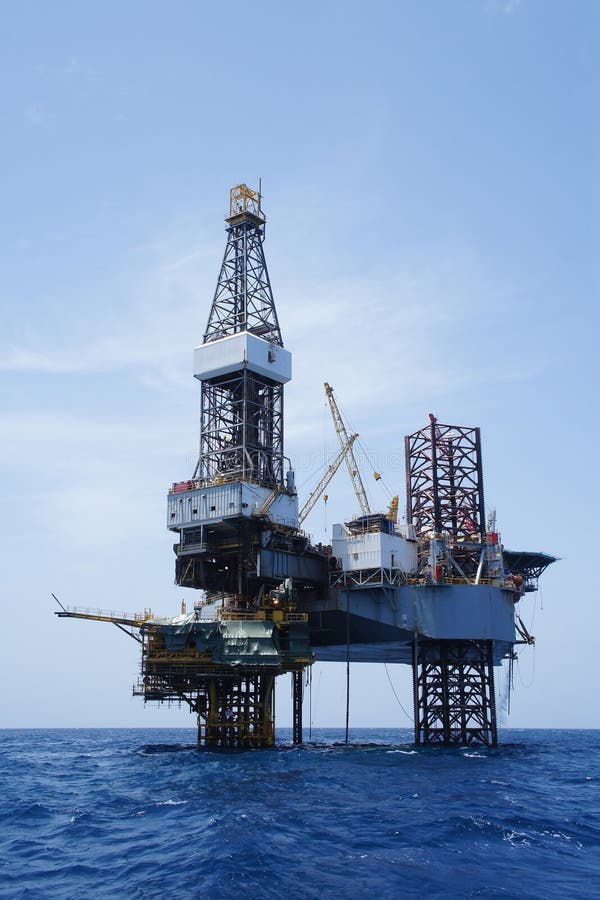 Offshore Jack Up Rig and the Production Platform Stock Image - Image of ...