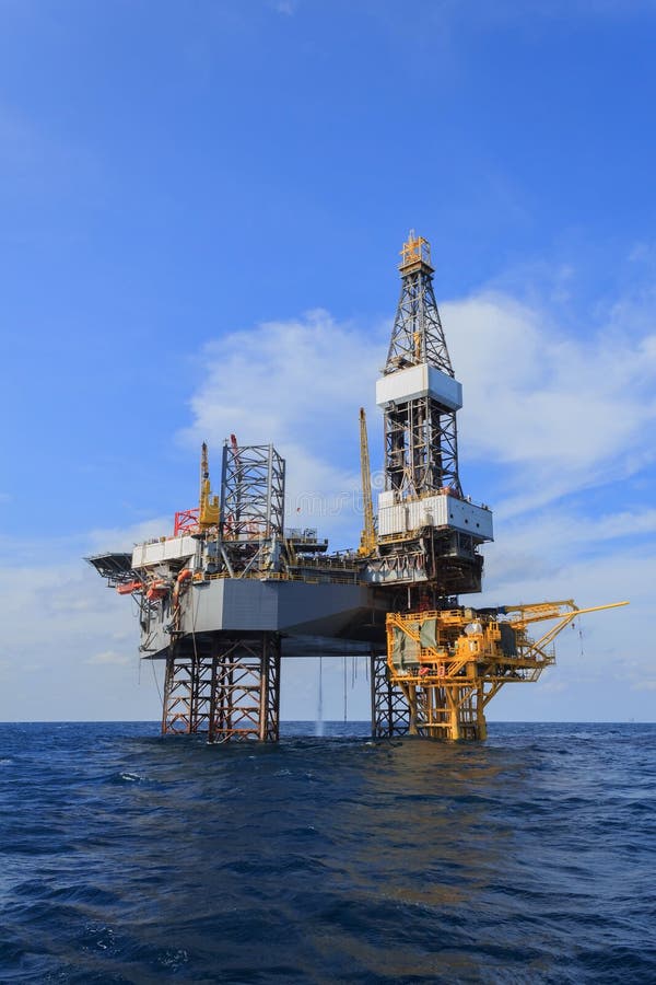 Offshore Jack Up Drilling Rig Over the Production Platform Stock Photo ...
