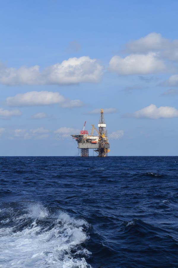 Offshore Jack Up Drilling Rig Over the Production Platform Stock Image ...