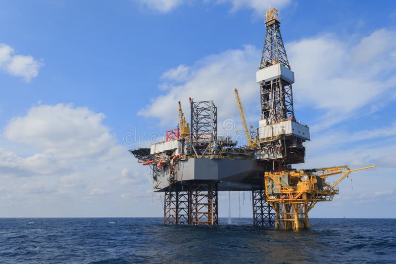 Offshore Jack Up Drilling Rig Over the Production Platform Stock Photo ...