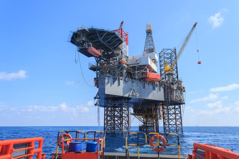 Offshore Jack Up Drilling Rig Over the Production Platform Stock Image ...