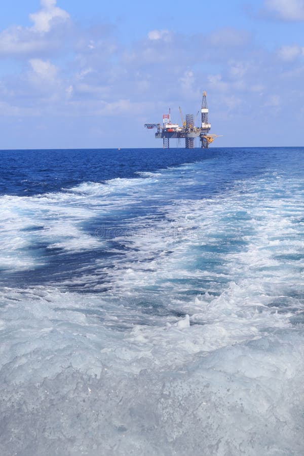 Offshore Jack Up Drilling Rig Over the Production Platform Stock Photo ...