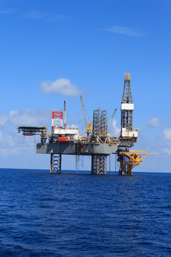 Offshore Jack Up Drilling Rig Over the Production Platform Stock Photo ...