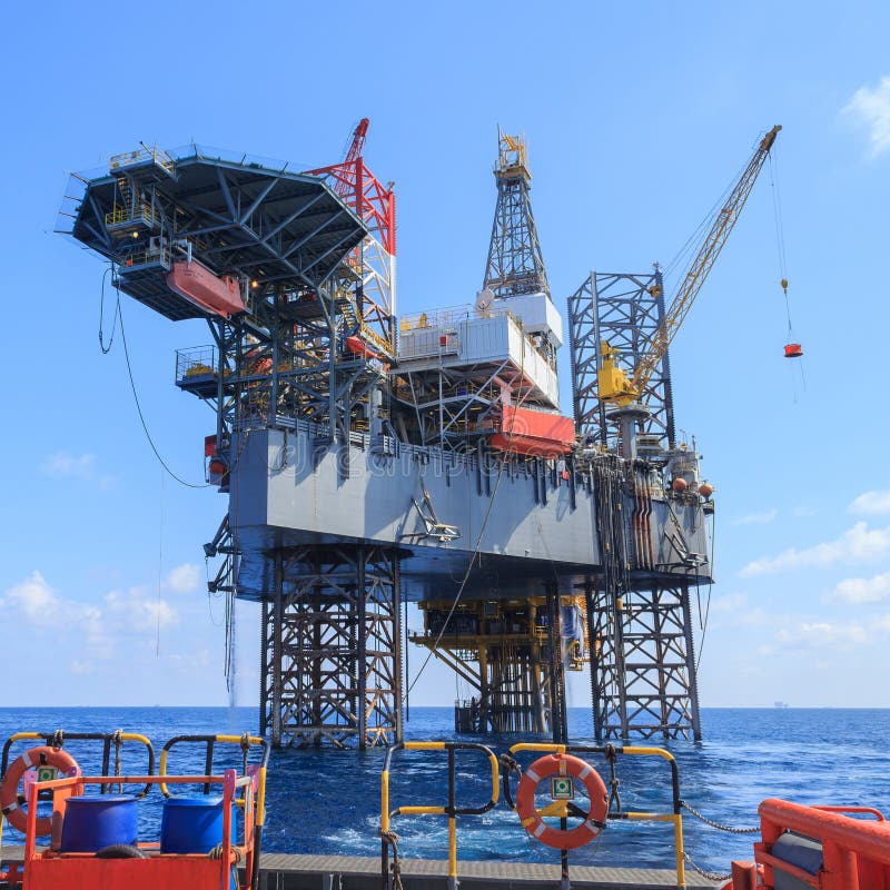 Offshore Jack Up Drilling Rig Over the Production Platform Stock Image ...