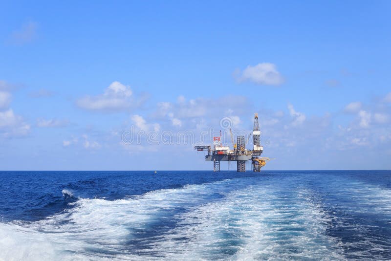 Offshore Jack Up Drilling Rig Over the Production Platform Stock Photo ...