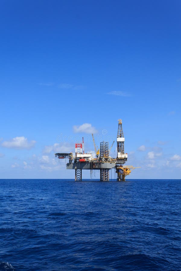 Offshore Jack Up Drilling Rig Over the Production Platform Stock Image ...