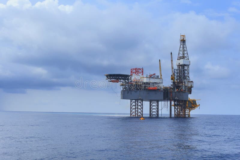 Offshore Jack Up Drilling Rig Over the Production Platform Stock Image ...