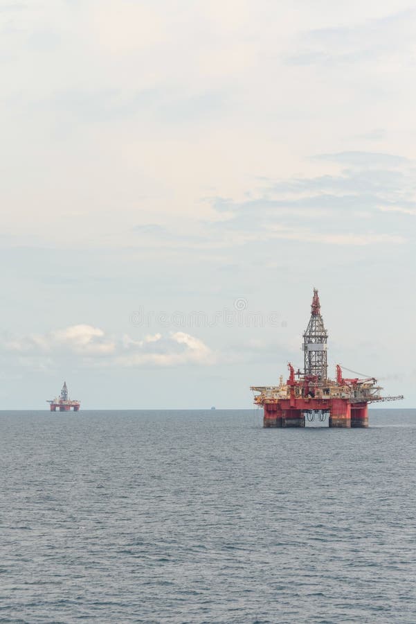 Offshore Jack Up Rig in the Middle of Sea Stock Photo - Image of ...