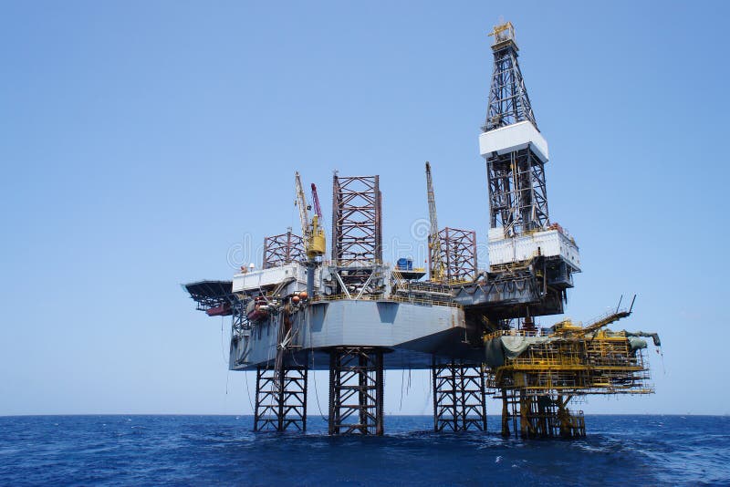 Offshore Oil and Gas Drilling Rig while Completion Well on Oil a Stock ...