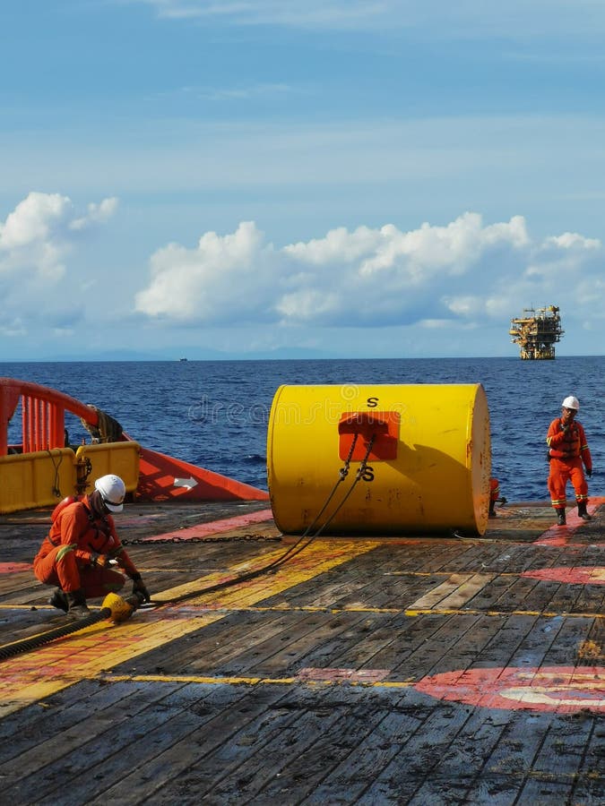 Offshore Marine Crew Working on Deck during Sunny Day Editorial ...