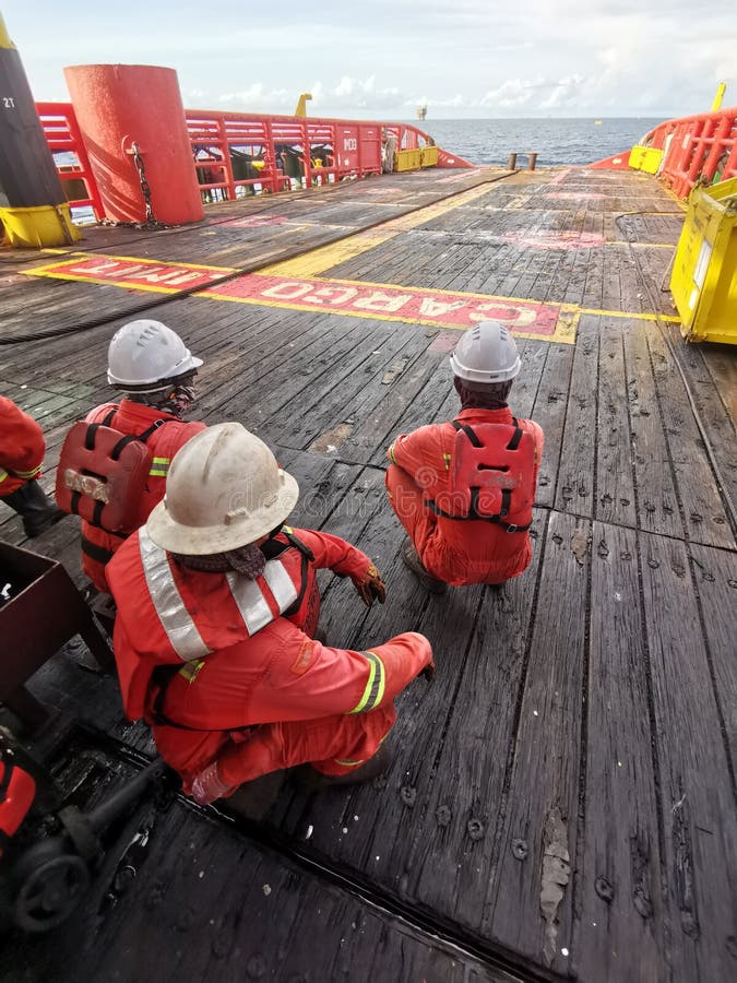 Offshore Marine Crew Working on Deck during Sunny Day Stock Image ...