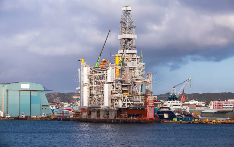 Offshore Oil Platform and Supply Ship are in Persian Gulf Stock Photo ...