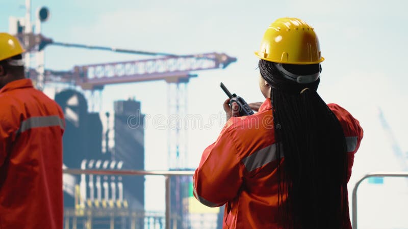 Offshore Platform Engineer Talking in Walkie Talkie, Following Safety ...