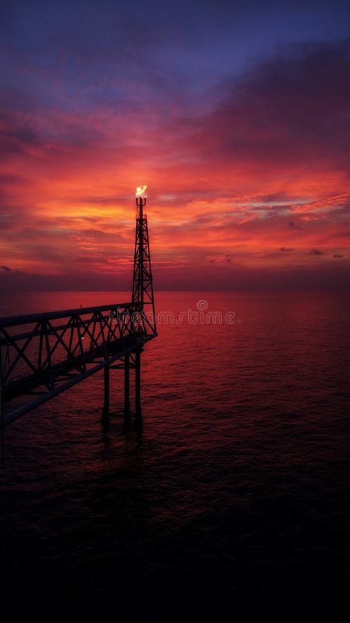 Offshore sunset stock photo. Image of cloud, sunset - 203011624