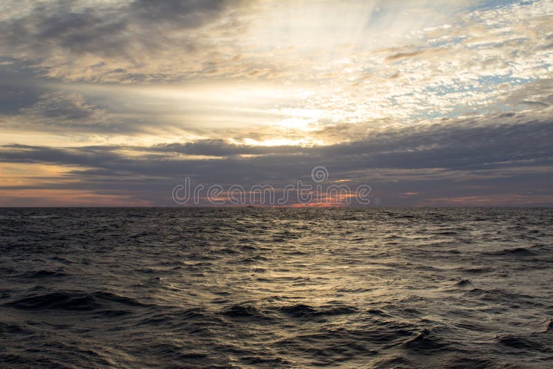 Offshore Oil Rig during Sunset Stock Photo - Image of land, machinery ...