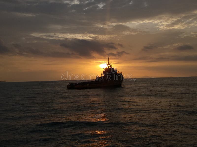 Offshore Oil Rig during Sunset Stock Photo - Image of land, machinery ...