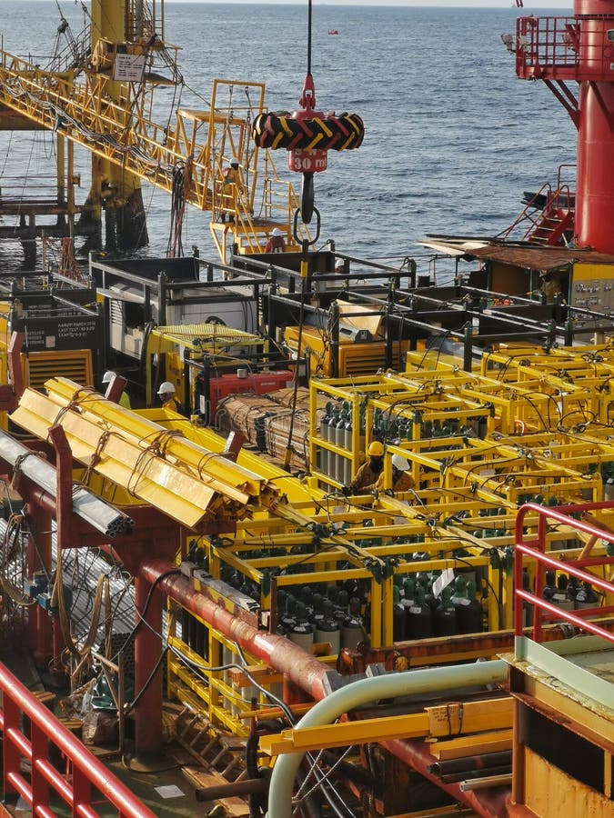 Offshore Support Vessel Deliver Cargo To Oil Platform at Sea Editorial ...