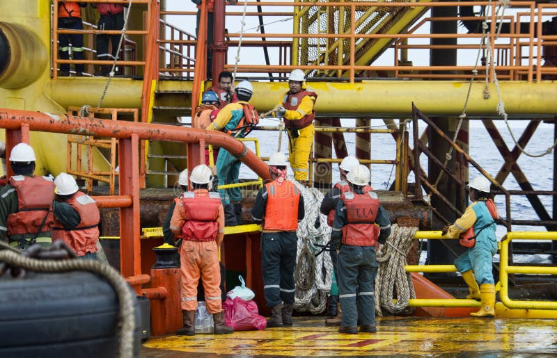 Offshore working on deck editorial photography. Image of drilling ...
