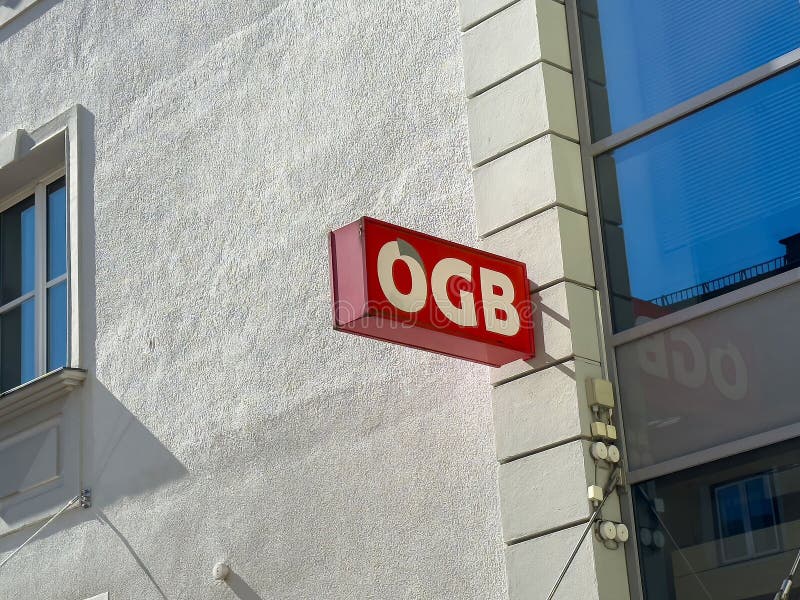 Ogb Red Sign on Building Wall in Urban Setting with Reflection ...