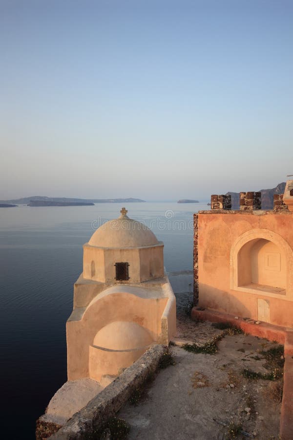 Oia castle at sunrise stock image. Image of flag, mediterranean - 24660481